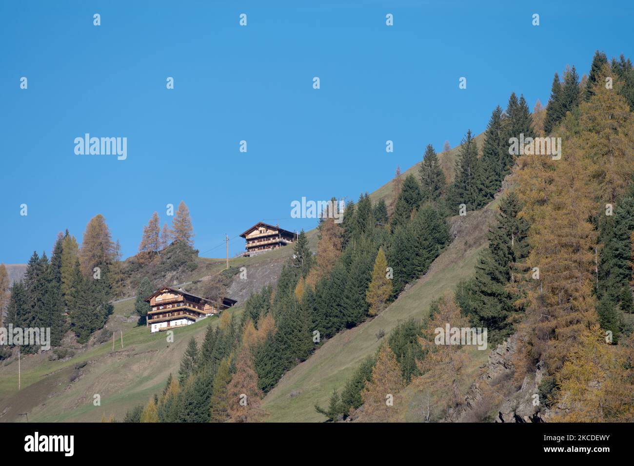 Landscape steep mountains steeply sloping meadows and two very old ...