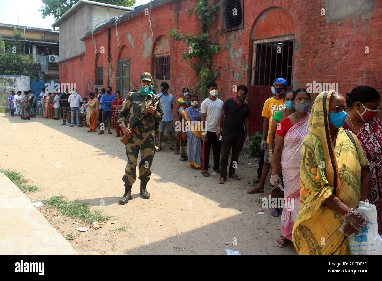Indian elections queue hi-res stock photography and images - Alamy