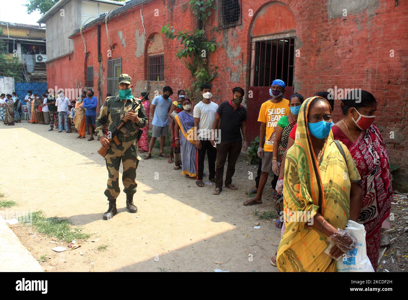 Indian elections queue hi-res stock photography and images - Alamy