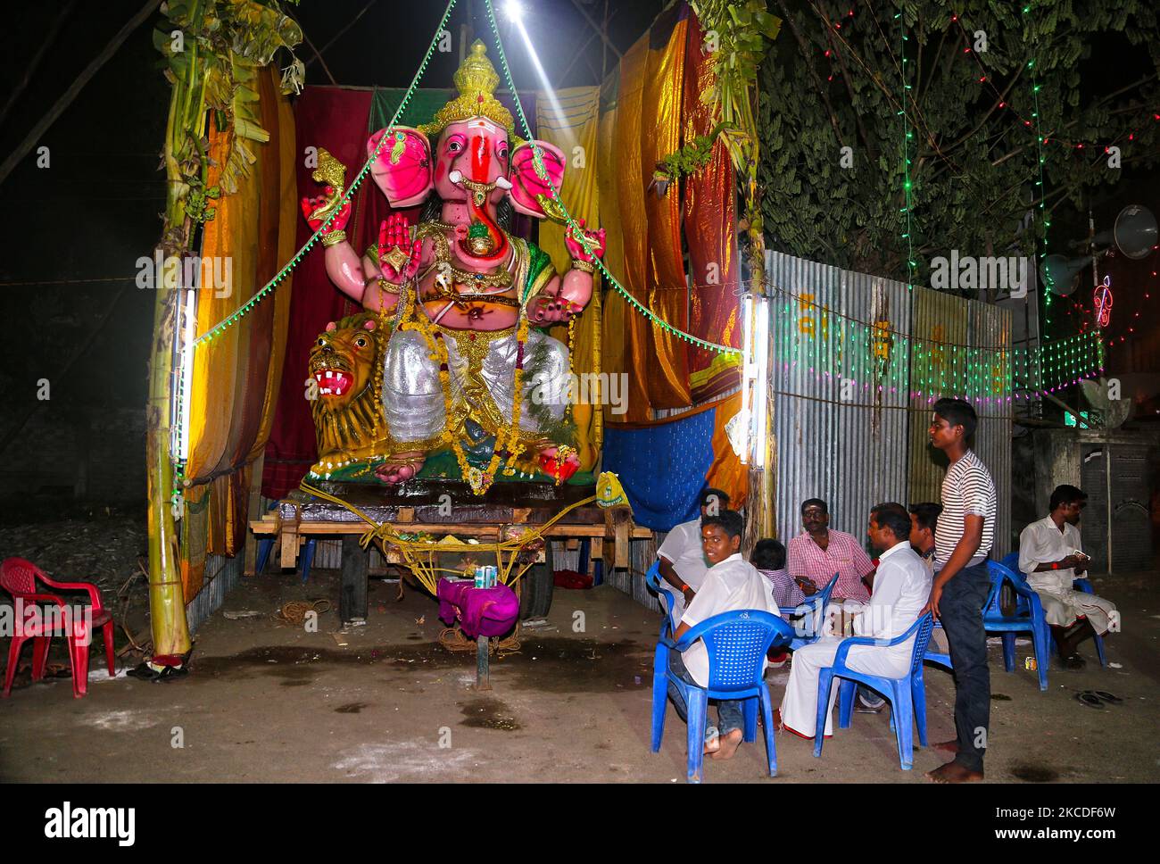 Large clay idol of Lord Ganesha (Lord Ganesh) at a pandal (temporary ...
