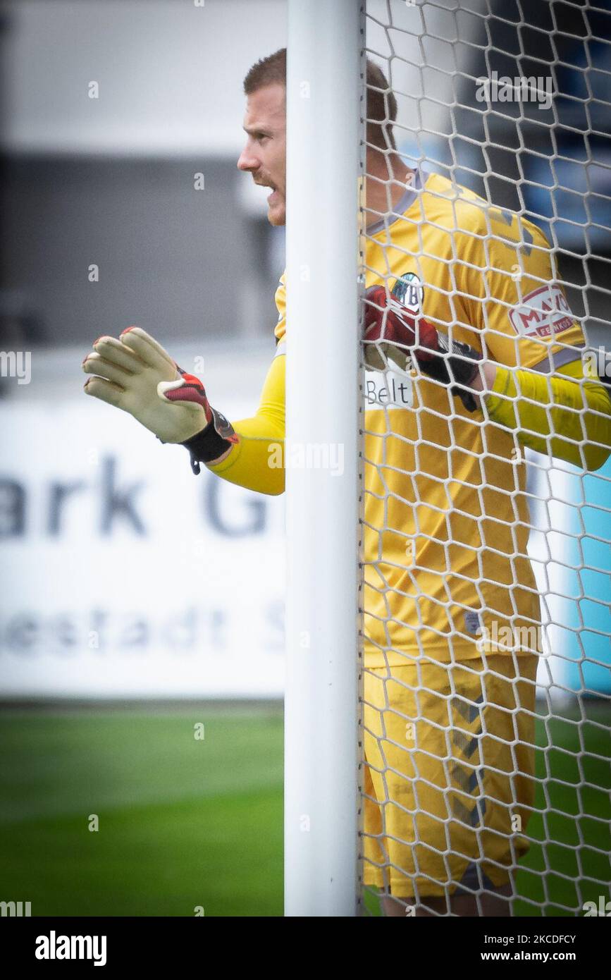 Goalkeeper lukas raeder of luebeck gestures ball hi-res stock ...