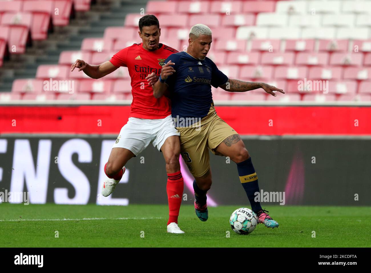 Lucas Verissimo of SL Benfica (L) vies with Cryzan of CD Santa Clara ...