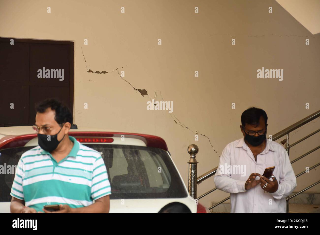 A cracks in a wall at an apartment building after a high-intensity ...