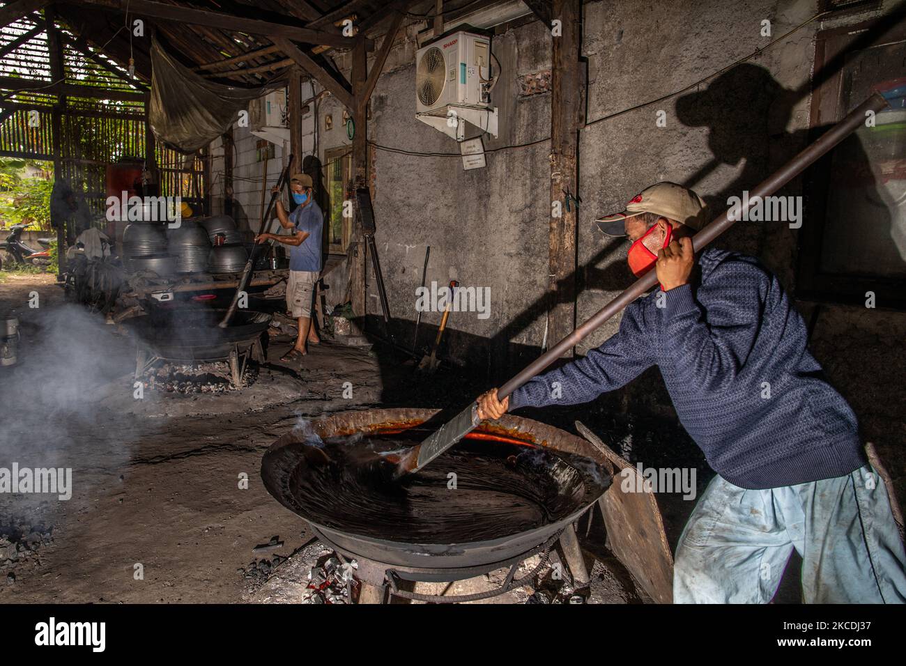The making of ''Dodol'' Indonesia Traditional food ahead of eid fitri ...