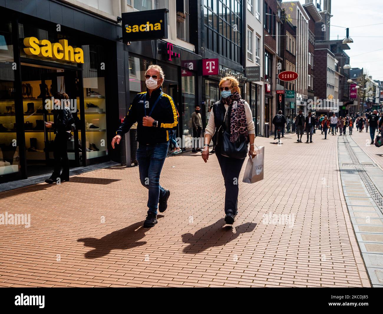 People flocked to the stores and terraces to enjoy again shopping and ...