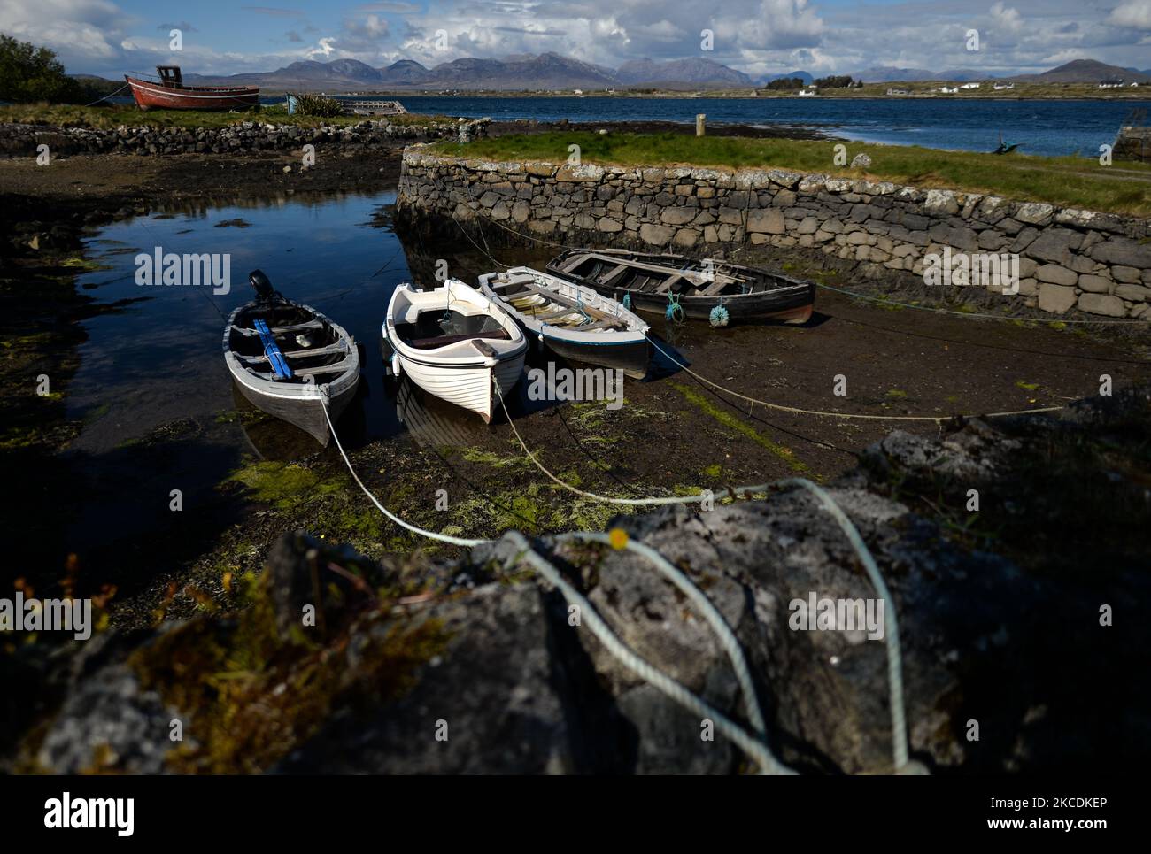 Wooden fishing boats seen in Roundstone, during the COVID-19 lockdown ...