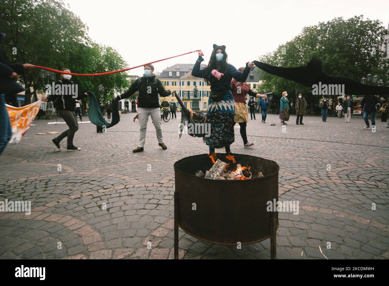 protesters dance in front of May bonfire during the Women Walpugis ...