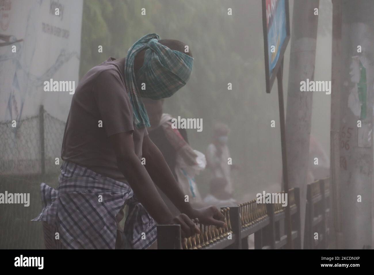 Commuters during sand storm in Guwahati, Assam, India on Saturday, 01 ...
