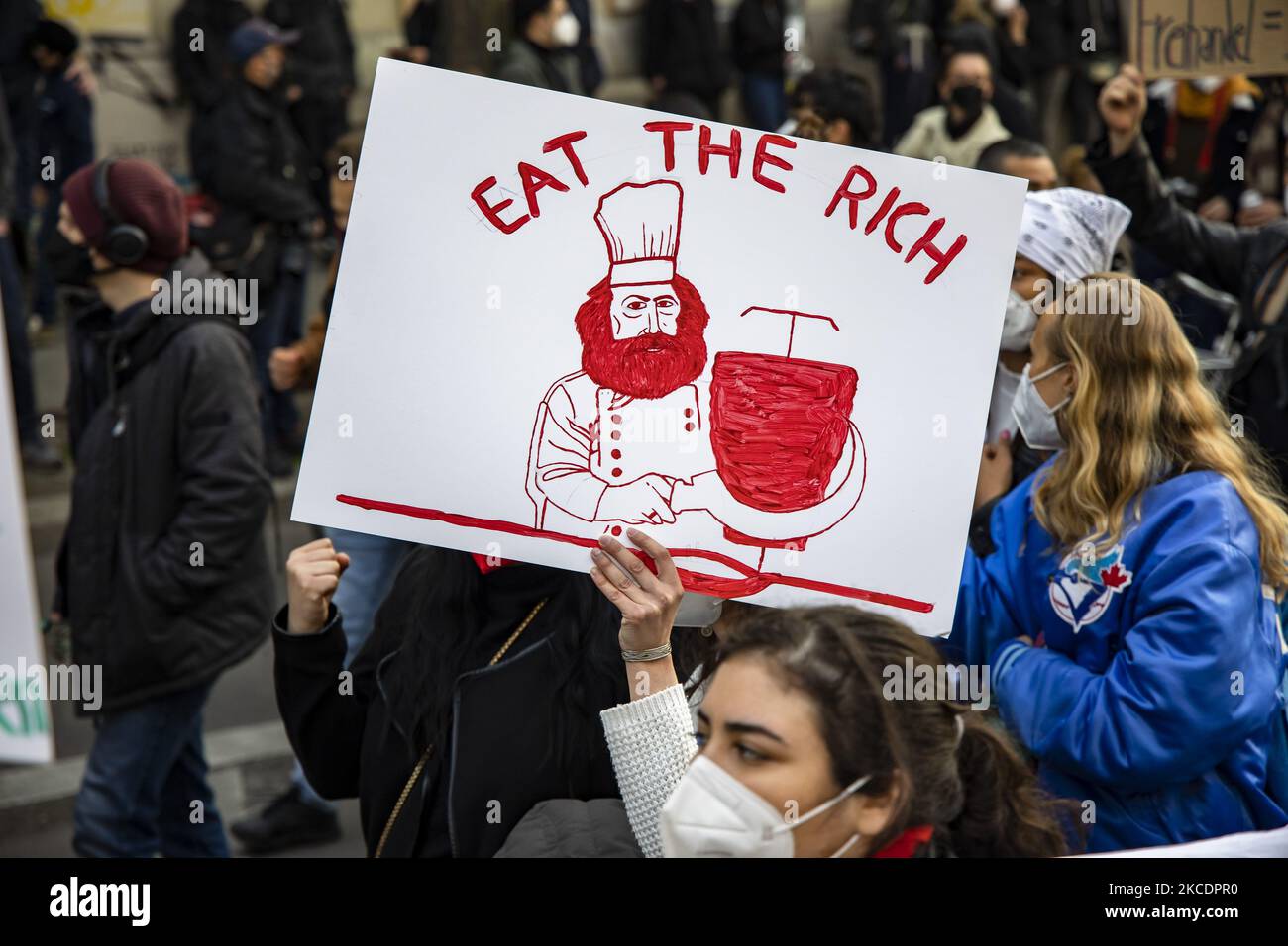 People attend a demonstration 'Revolutionary 1 May'in Berlin, Germany ...