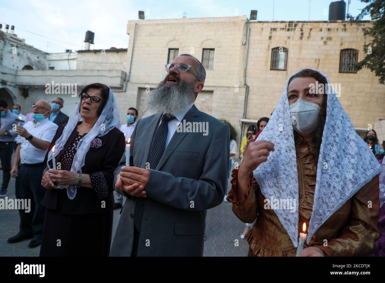 Palestinian Christian Catholics attend an Easter Vigil mass in Gaza ...