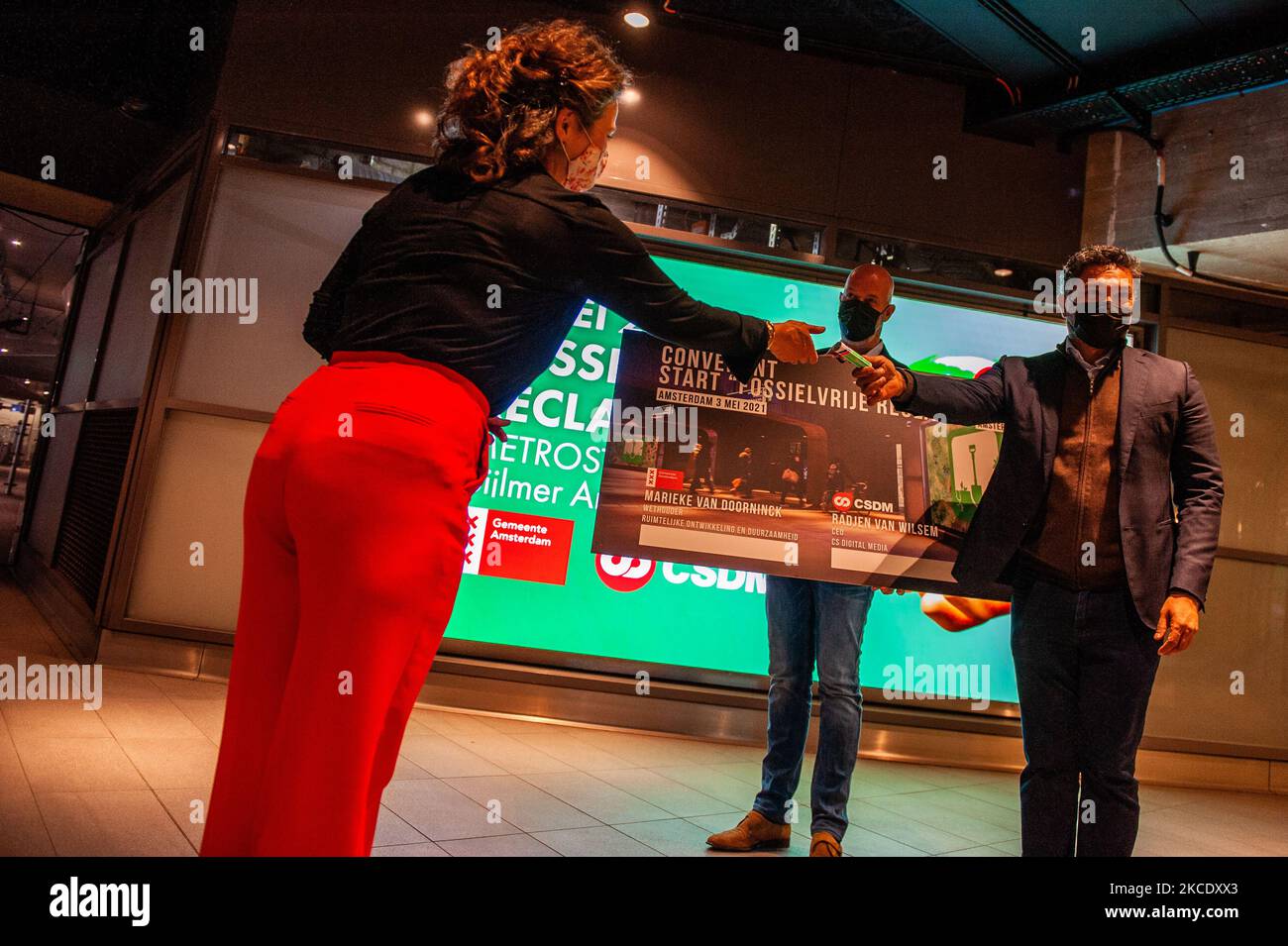 Radjen van Wilsem, CEO of CS Digital Media is giving a pen to sign the ...