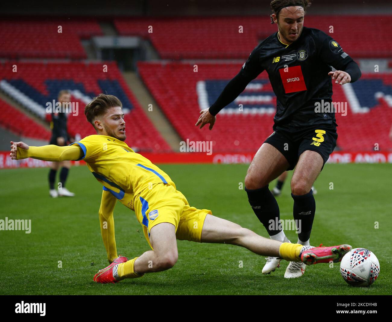 L-R Lewis Simper of Concord Rangers (on loan from Cambridge United) and ...