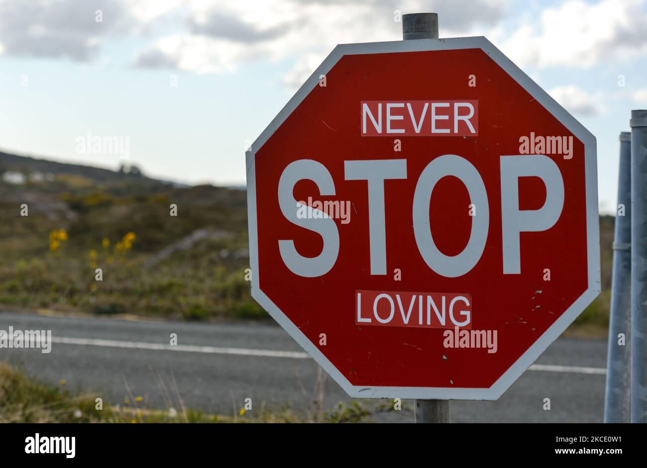 A STOP sign 'Never Stop Loving' seen in the Central Connemara. On ...