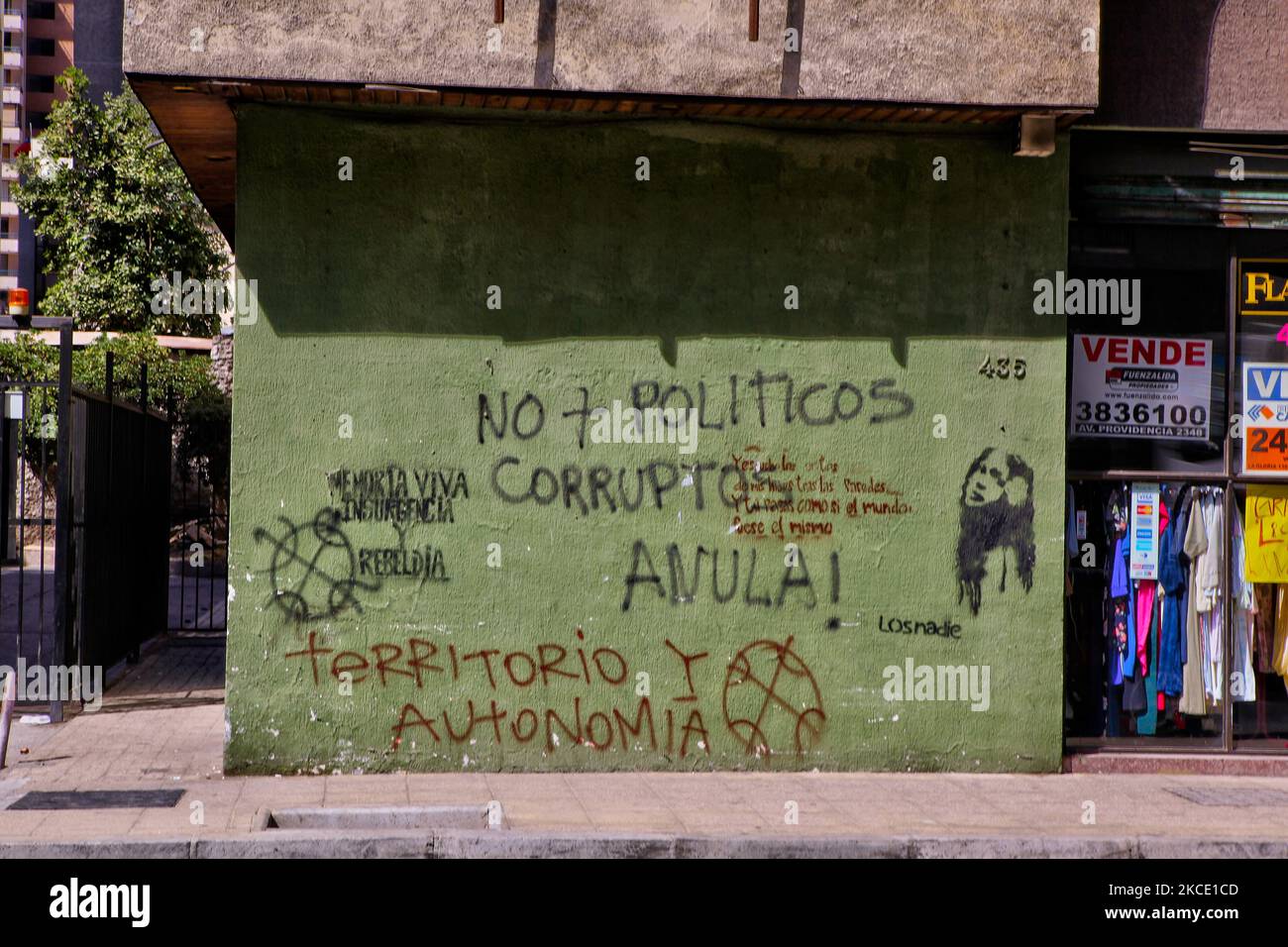 Political graffiti (with the words 'no to political corruption') on a ...