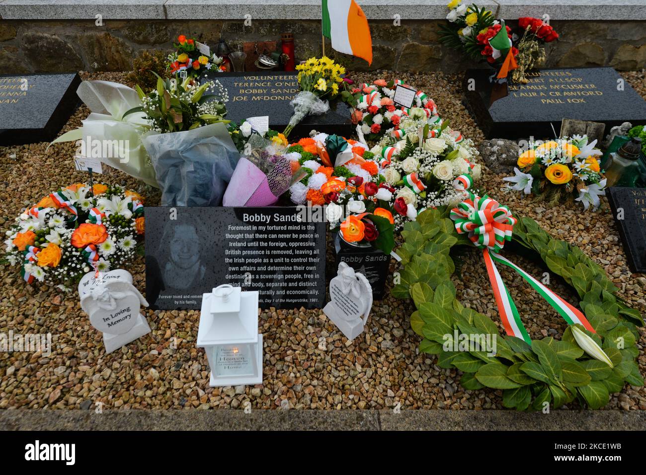 Flowers and wreaths left on Bobby Sands' grave in Milltown Cemetery on ...
