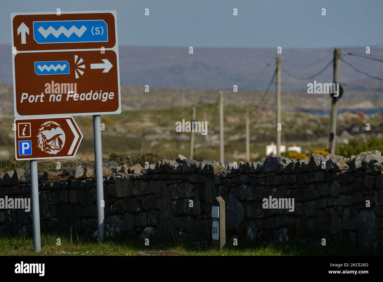 Signs for the Wild Atlantic Way seen along the road near Errisbeg West ...