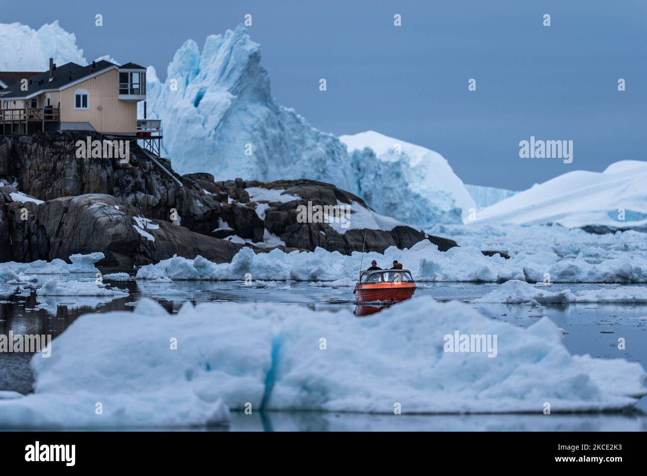 Icebergs near Ilulissat, Greenland. Climate change is having a profound ...