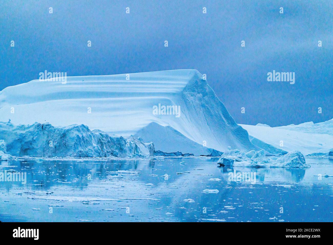 Icebergs near Ilulissat, Greenland. Climate change is having a profound ...