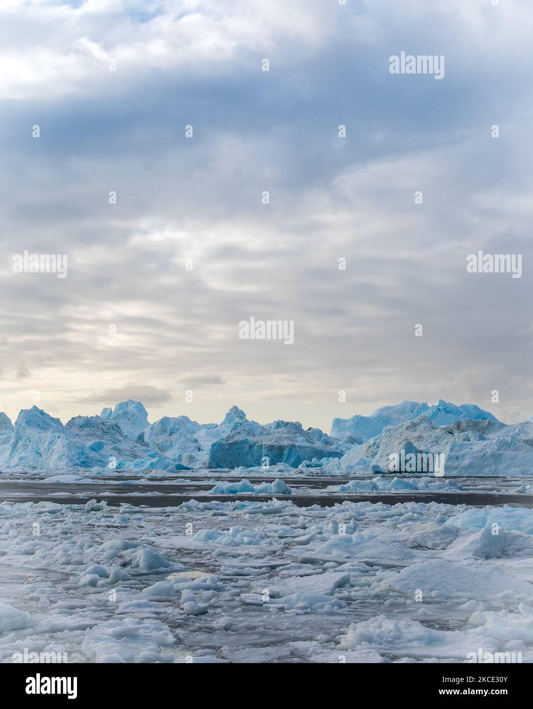 Icebergs near Ilulissat, Greenland. Climate change is having a profound ...