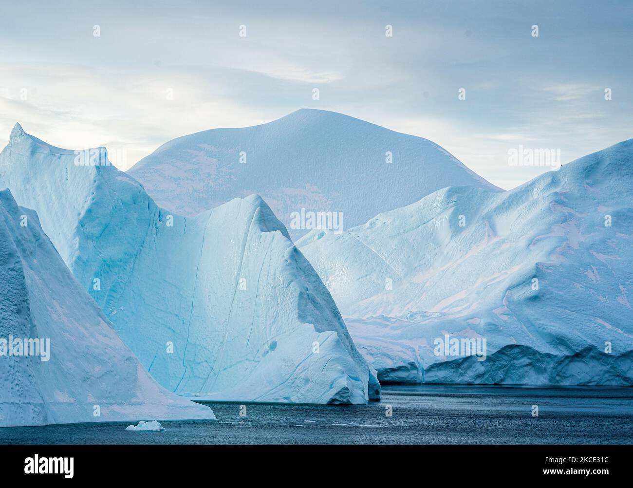Icebergs near Ilulissat, Greenland. Climate change is having a profound ...