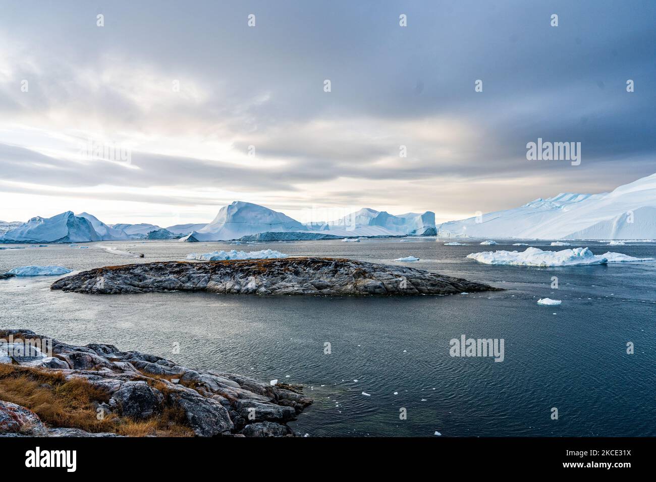Icebergs near Ilulissat, Greenland. Climate change is having a profound ...