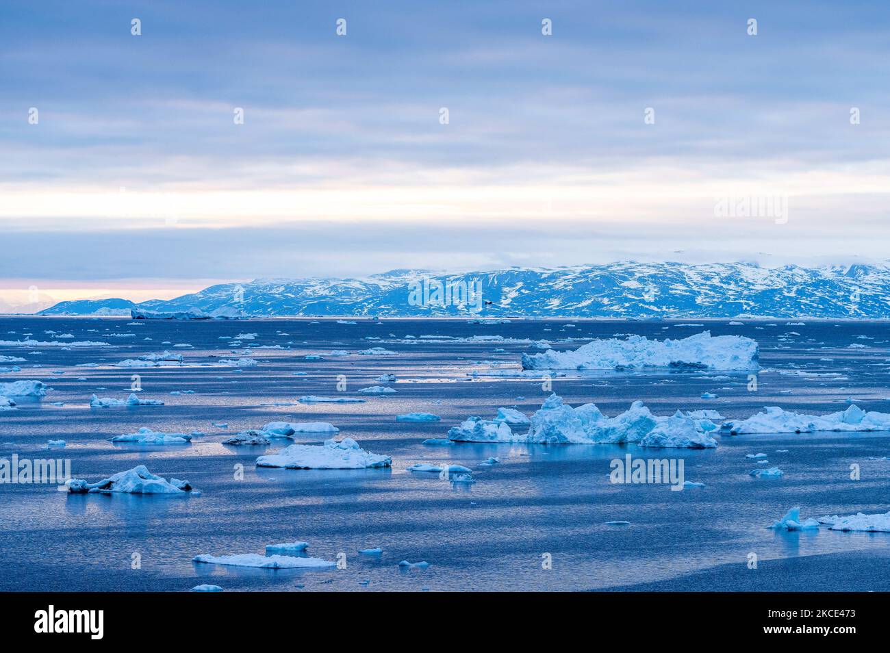 Icebergs near Ilulissat, Greenland. Climate change is having a profound ...