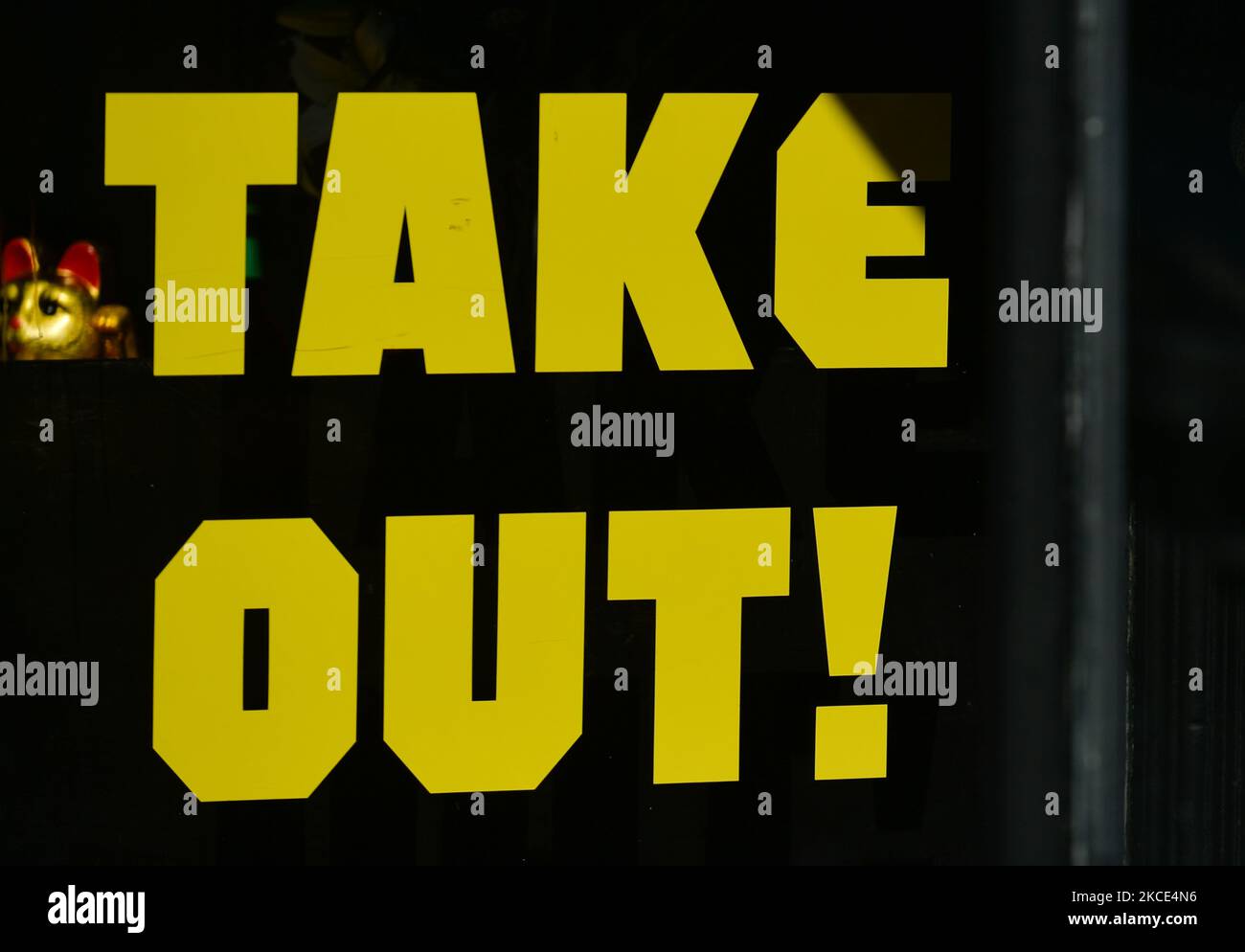 A sticker 'Take Out!' seen in the takeaway restaurant window during the ...