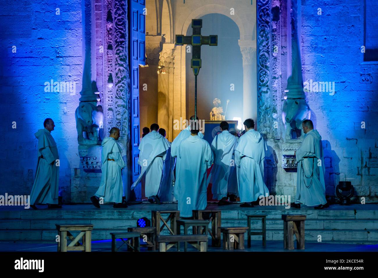 Priests return to the Basilica with the painting of San Nicola at the ...