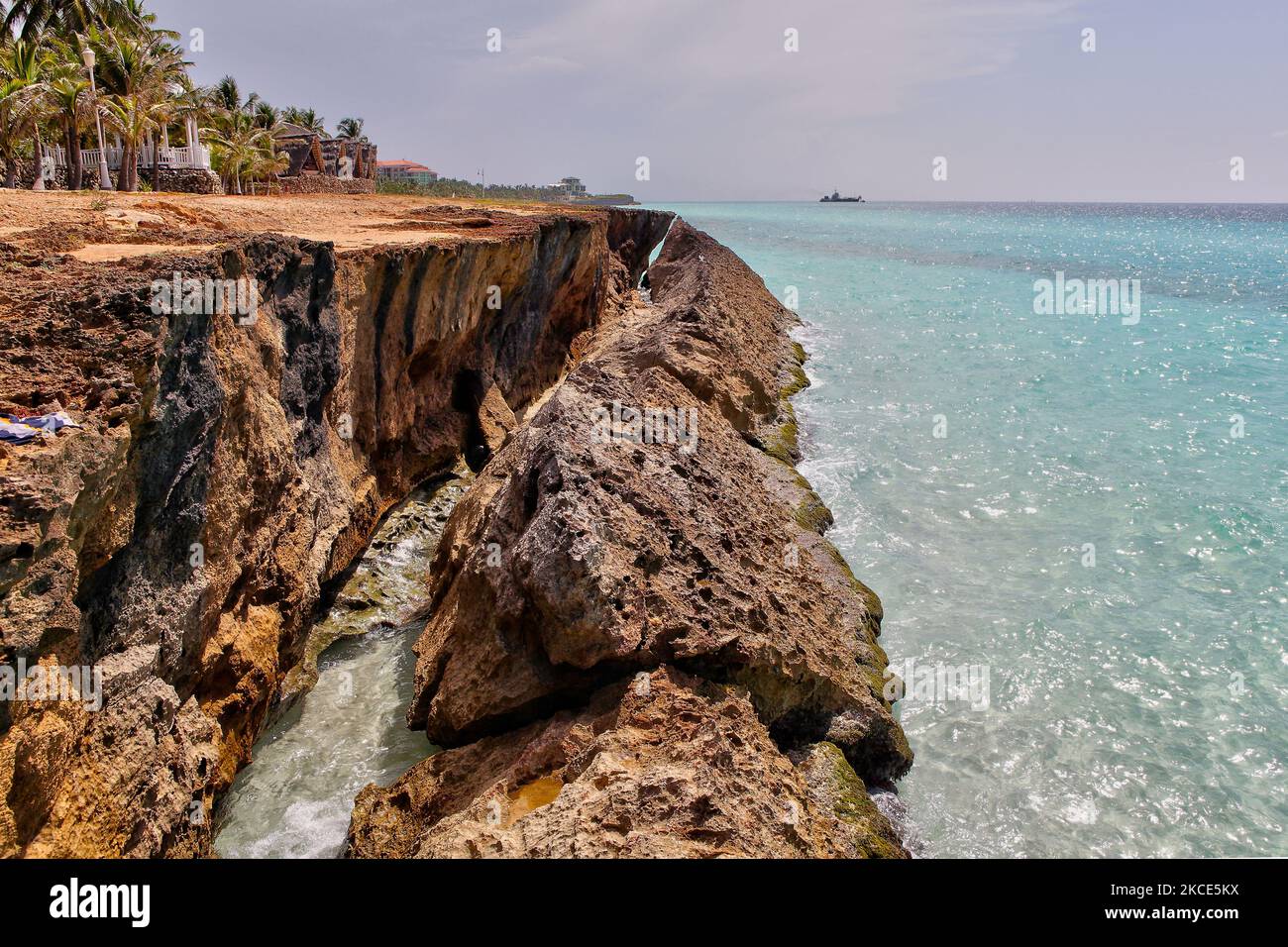 Collapsed rock cliff along the beach in Varadero, Cuba. (Photo by ...