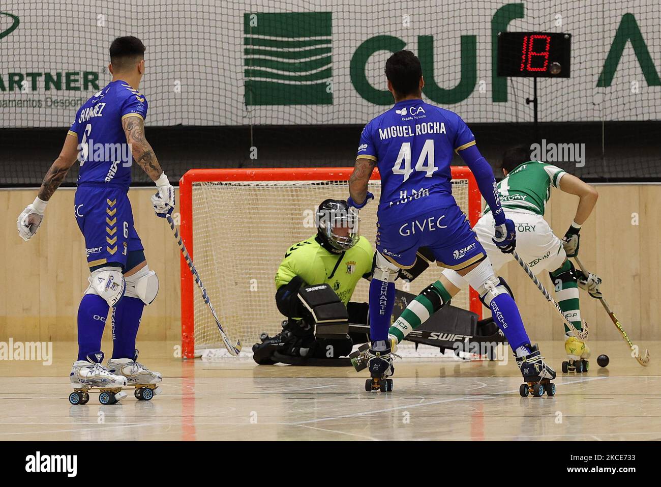 Ferran Font dueling the goalkeeper during the Rink Hockey playoffs 1st ...