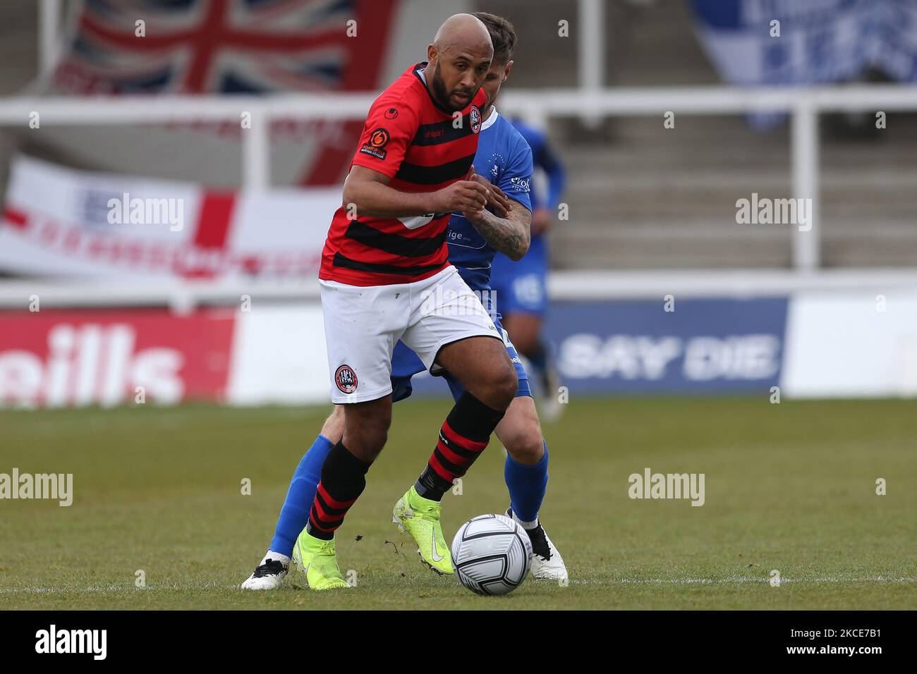 Gavan Holohan of Hartlepool United in action with James Comley during ...