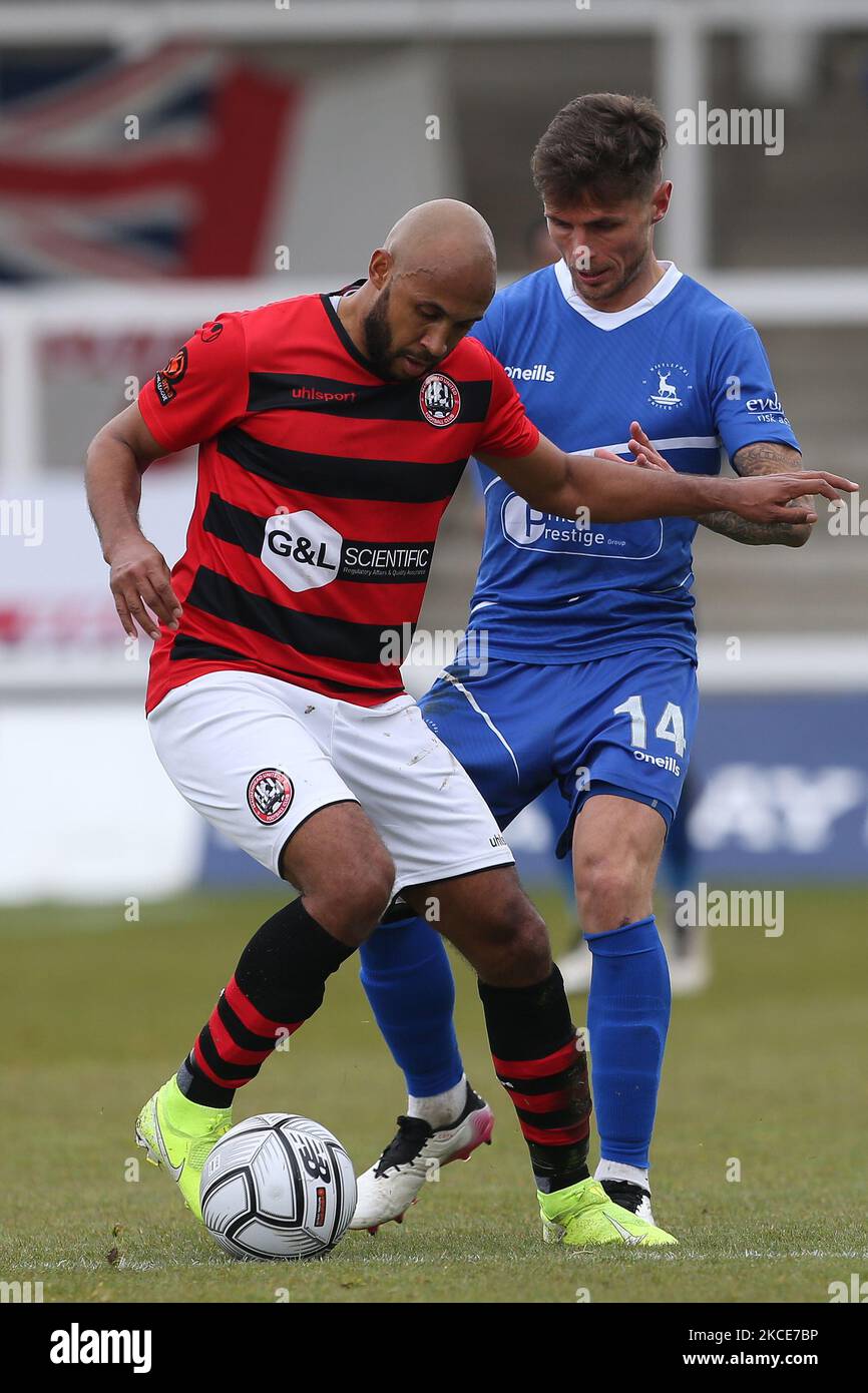 Gavan Holohan of Hartlepool United in action with James Comley during ...