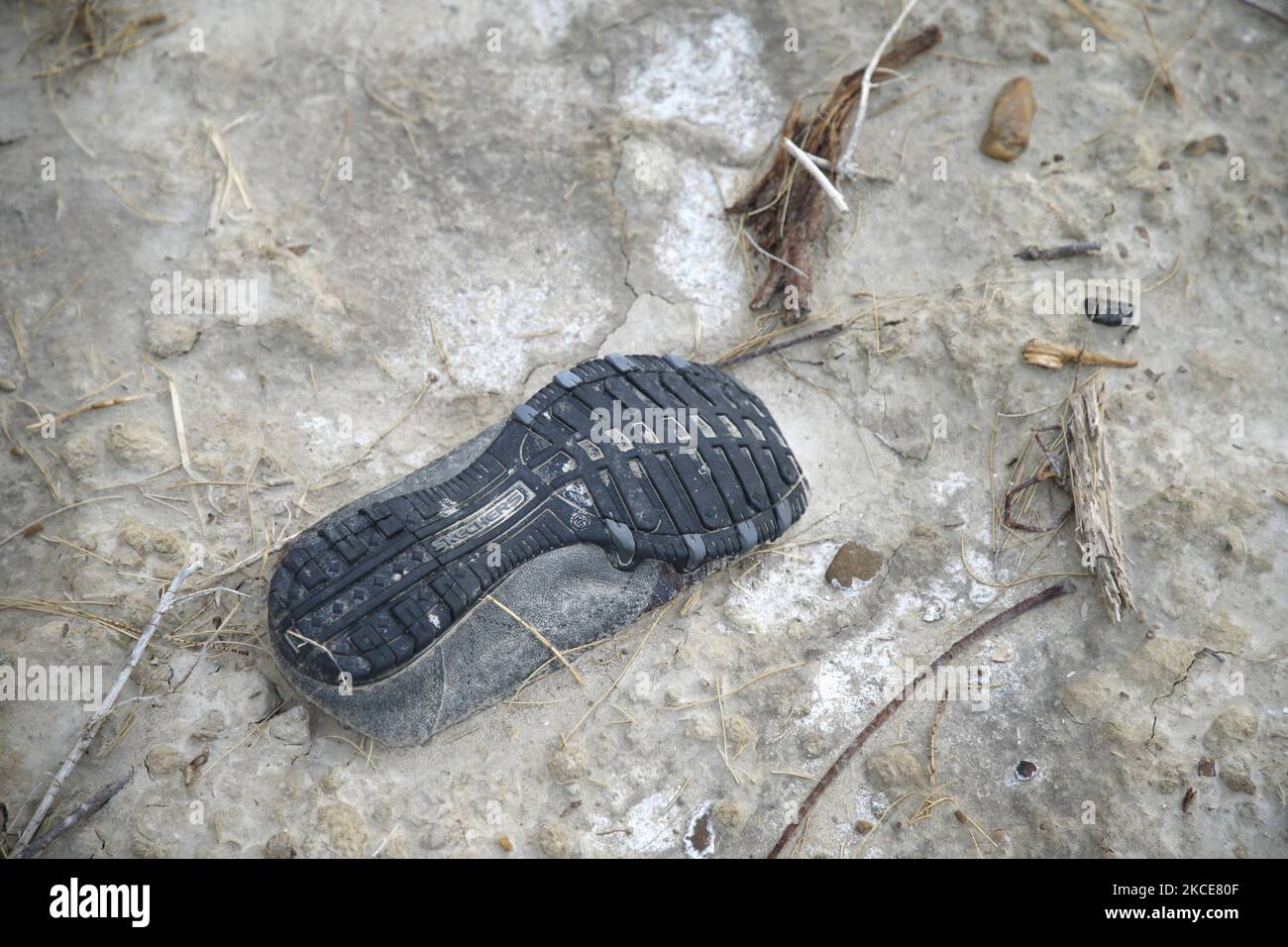 A discarded shoe is seen along the Rio Grande US/Mexican Border on May ...