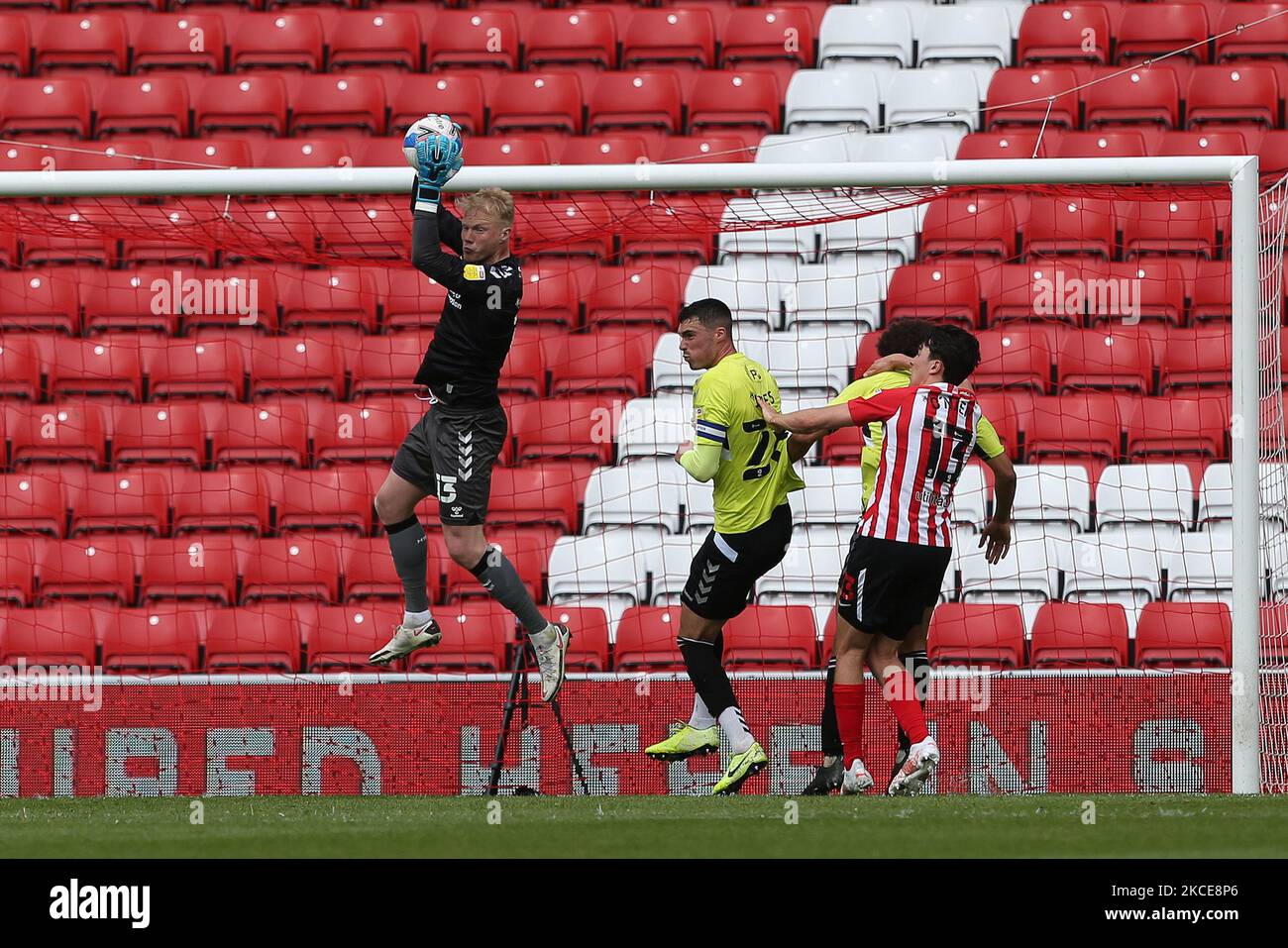 Jonathan Mitchell of Northampton Town claims a cross during the Sky Bet ...
