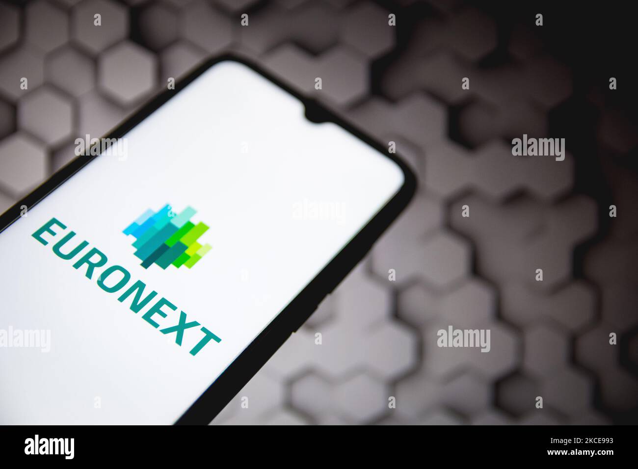 In this photo illustration an Euronext logo seen displayed on a ...