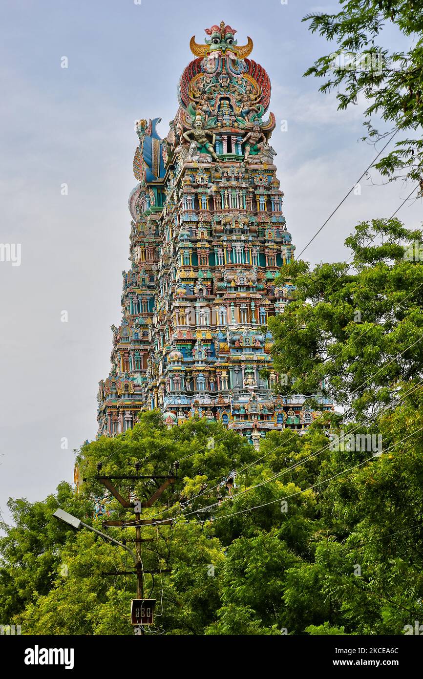 Colourful figures of Hindu deities adorn the gopura tower of the ...