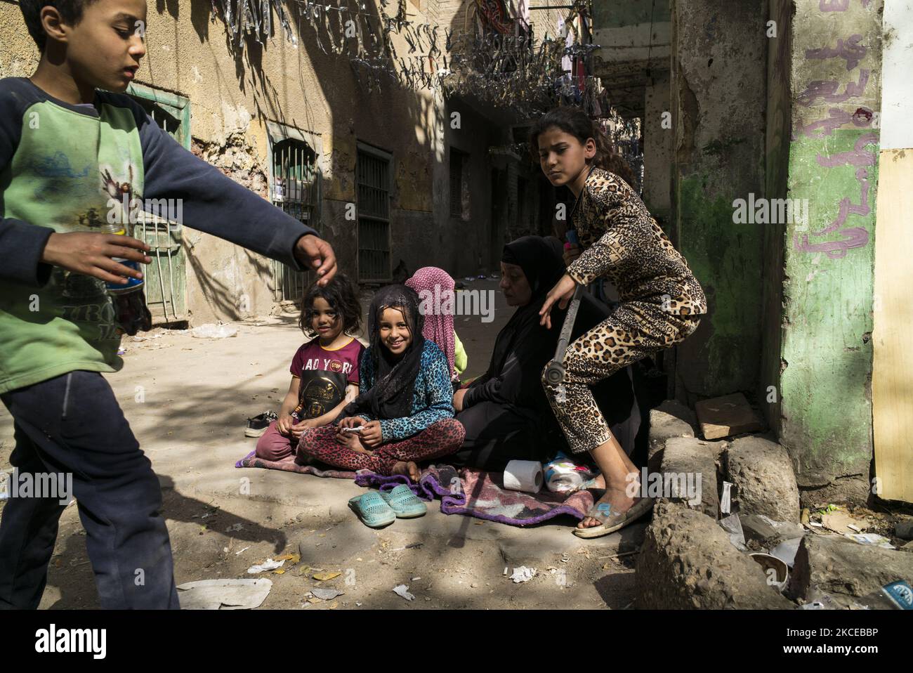Children in the streets of Shoubra , a local area of Cairo are playing ...