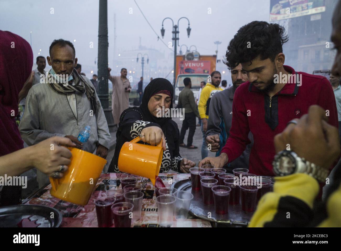Traditional fruit juice donation to the people in the Ramses train ...