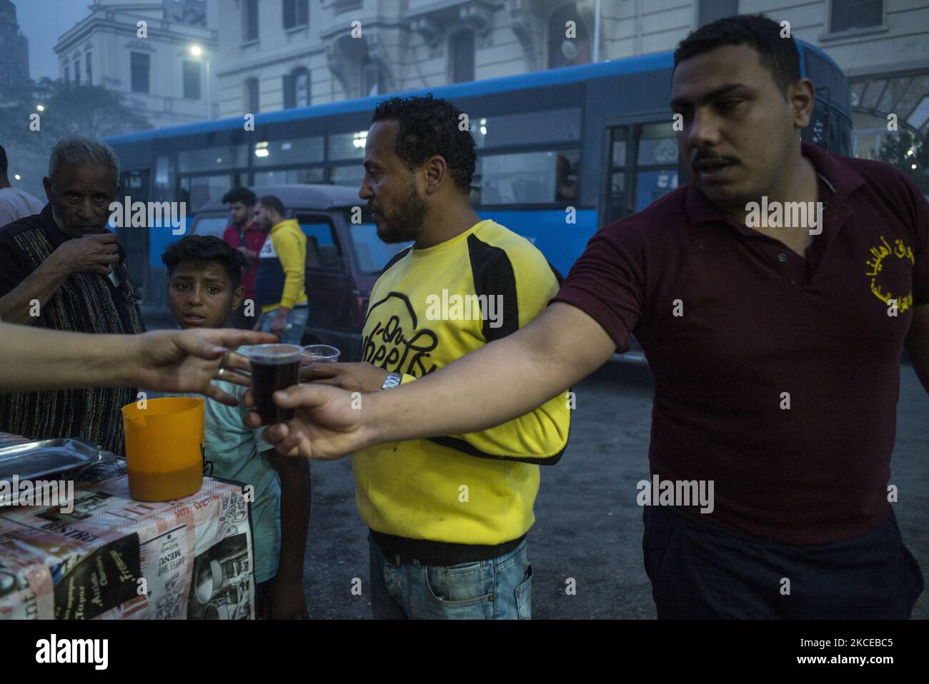 Traditional fruit juice donation to the people in the Ramses train ...