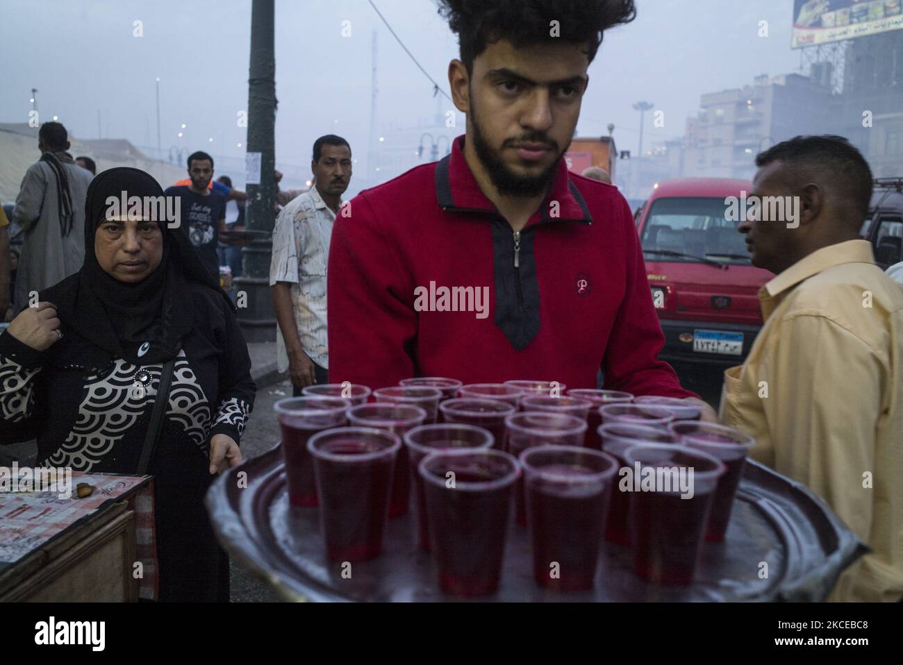 Traditional fruit juice donation to the people in the Ramses train ...