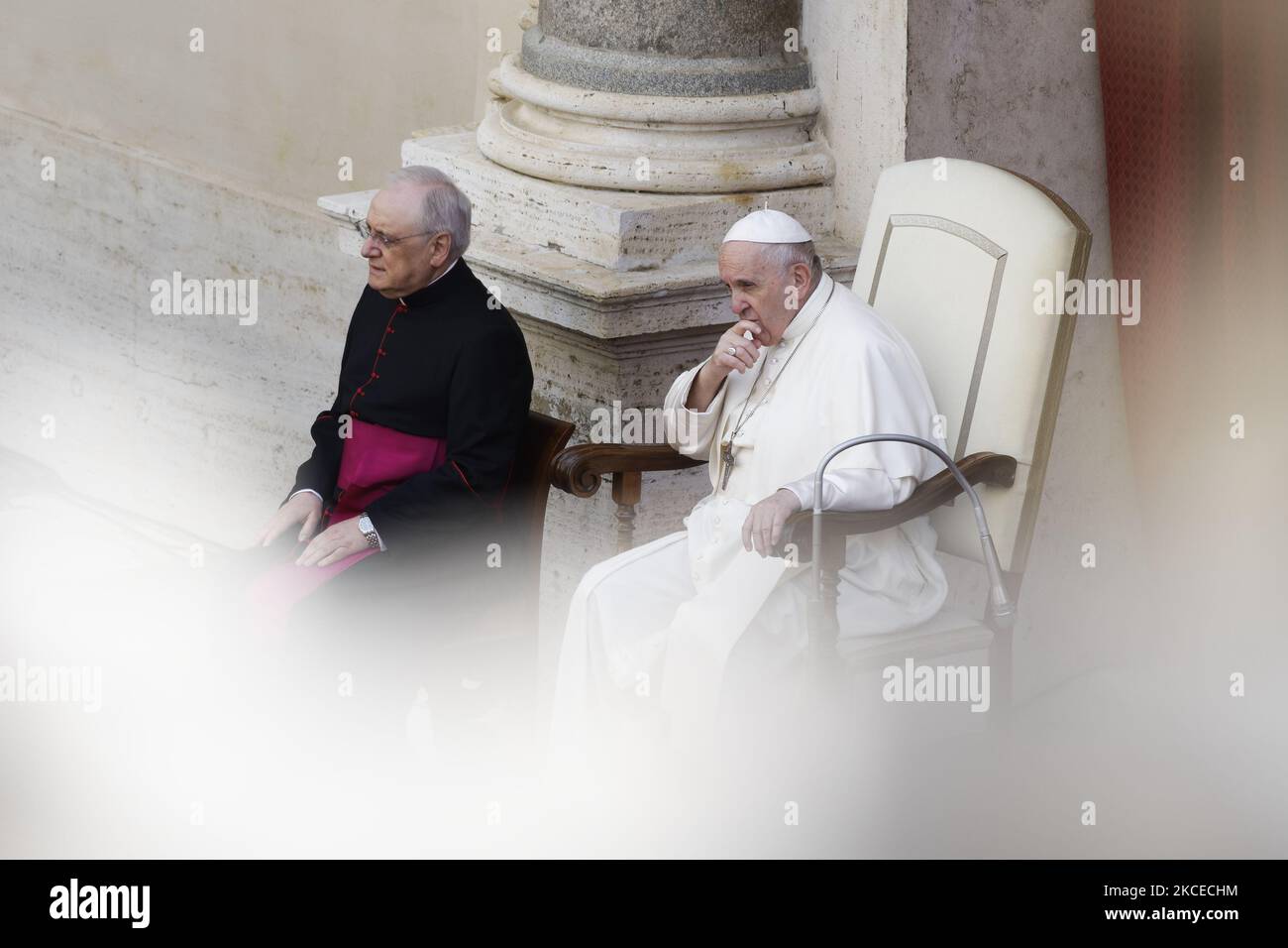 Pope Francis, right, begins the general audience in the St. Damaso ...