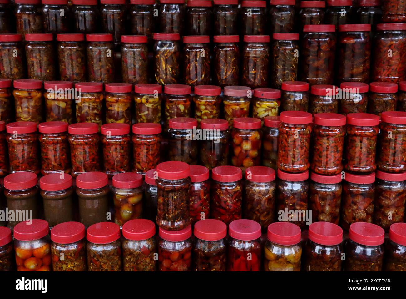 Stack of jar of home made pickles on a roadside stall, in Nongpoh ...