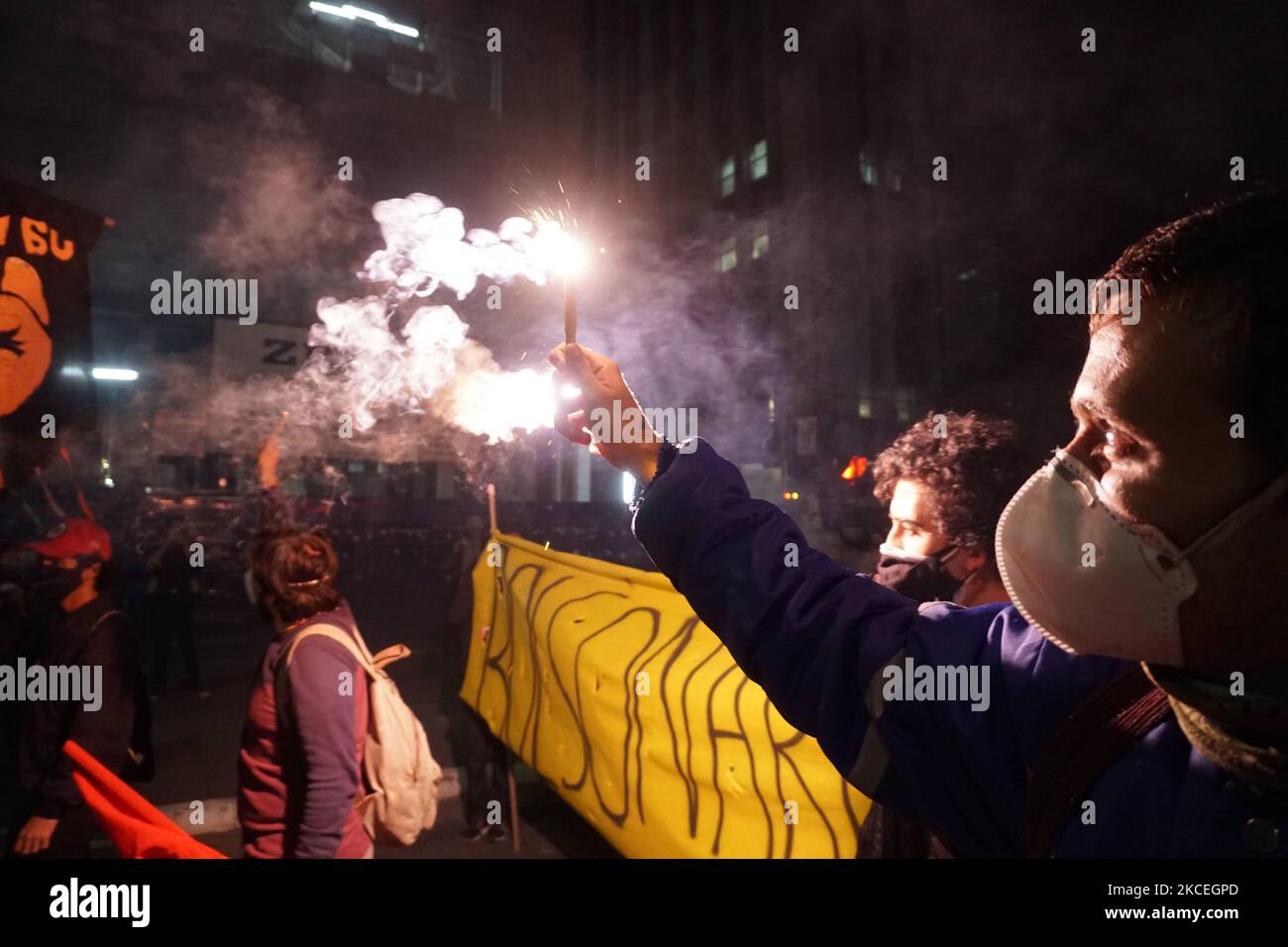 People take part in a protest during the National Day Against Racism ...