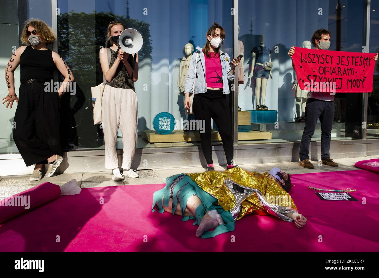 Climate activists gathered in front of one of Warsaw city center's ...