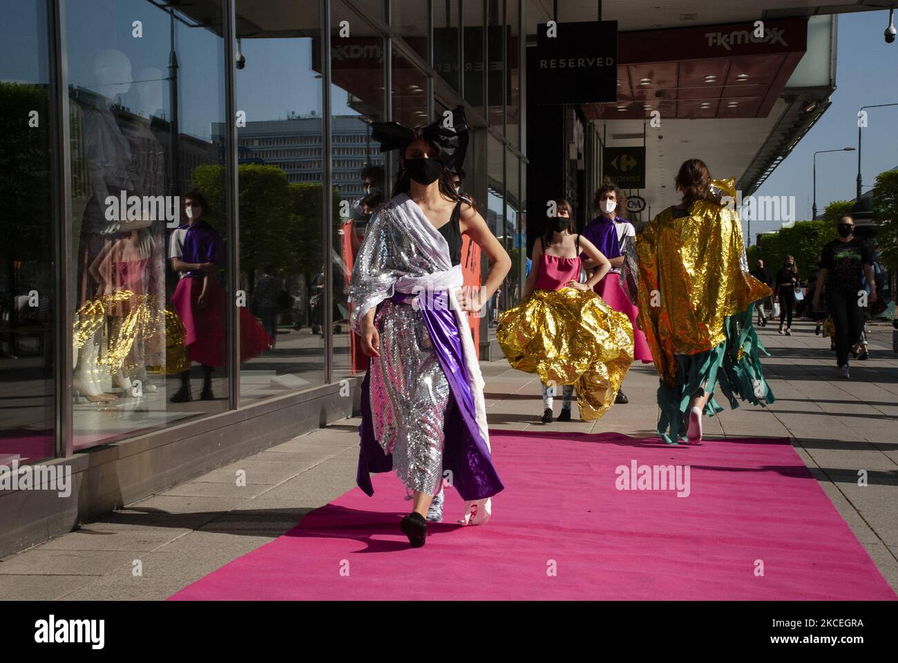 Climate activists gathered in front of one of Warsaw city center's ...