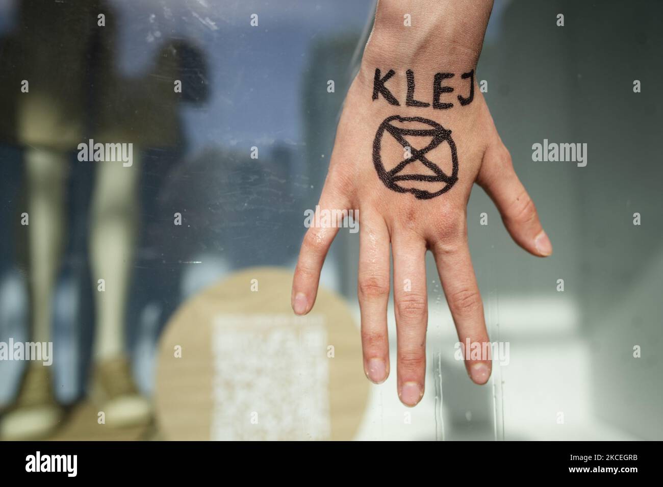 Climate activists gathered in front of one of Warsaw city center's ...