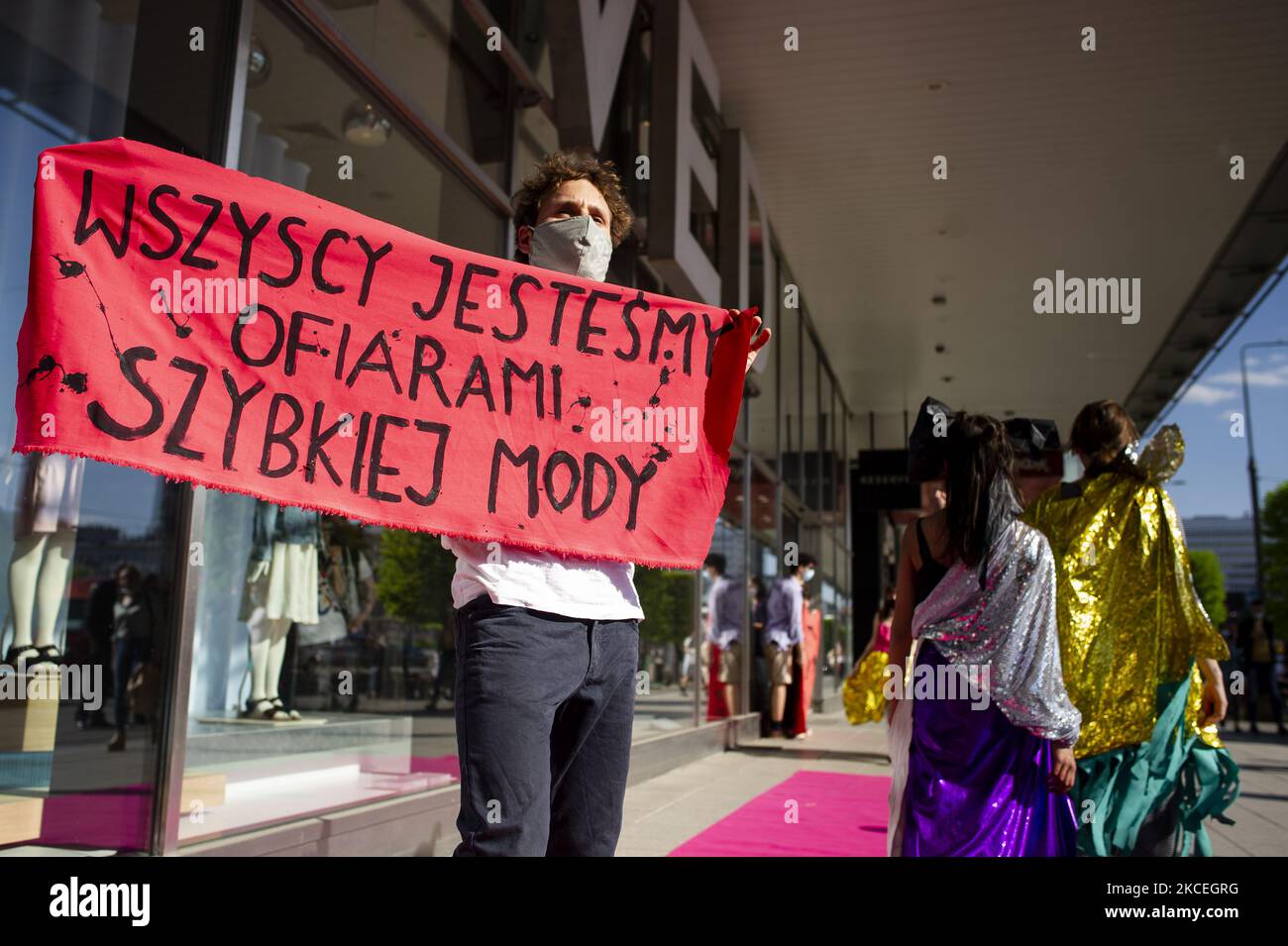 Climate activists gathered in front of one of Warsaw city center's ...