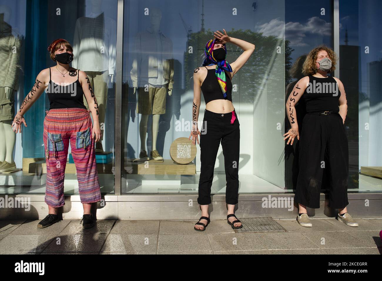 Climate activists gathered in front of one of Warsaw city center's ...