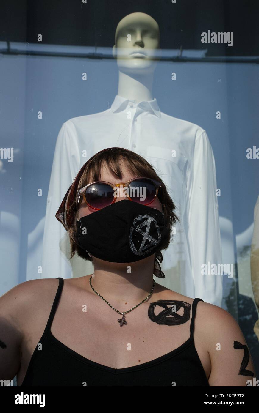 Climate activists gathered in front of one of Warsaw city center's ...