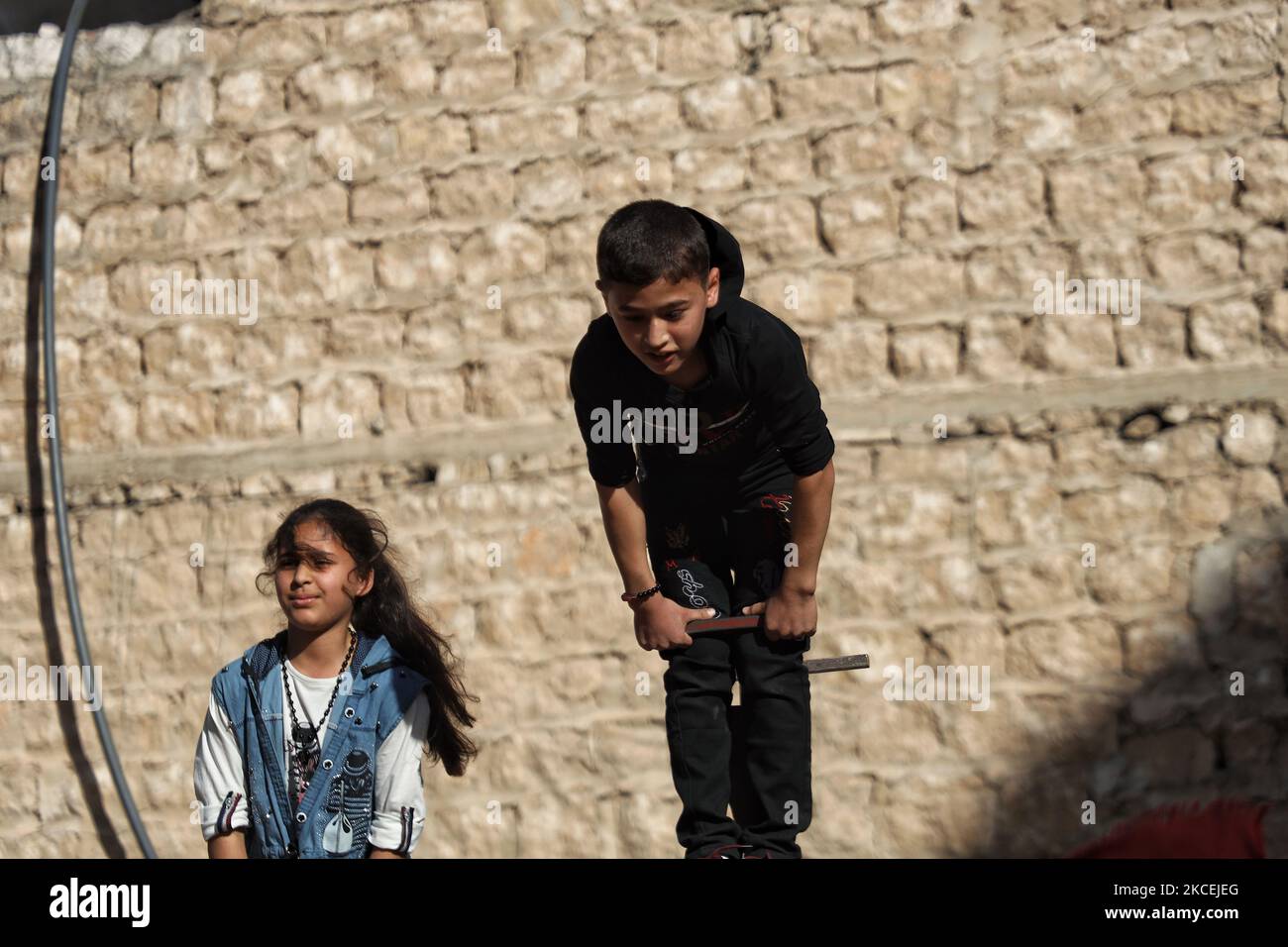 Syrian children celebrate Eid al-Fitr in a playground in the city of ...